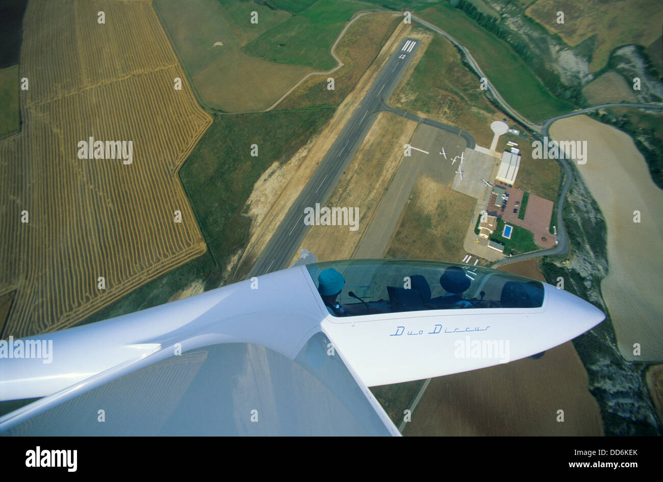 Glider plane Duo Discus flying over aerodrome of Santa Cilia de Jaca ...