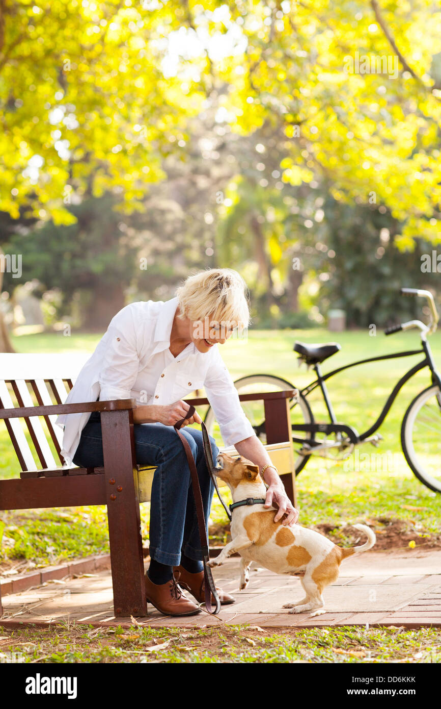 Happy elderly lady with dog hi-res stock photography and images - Alamy