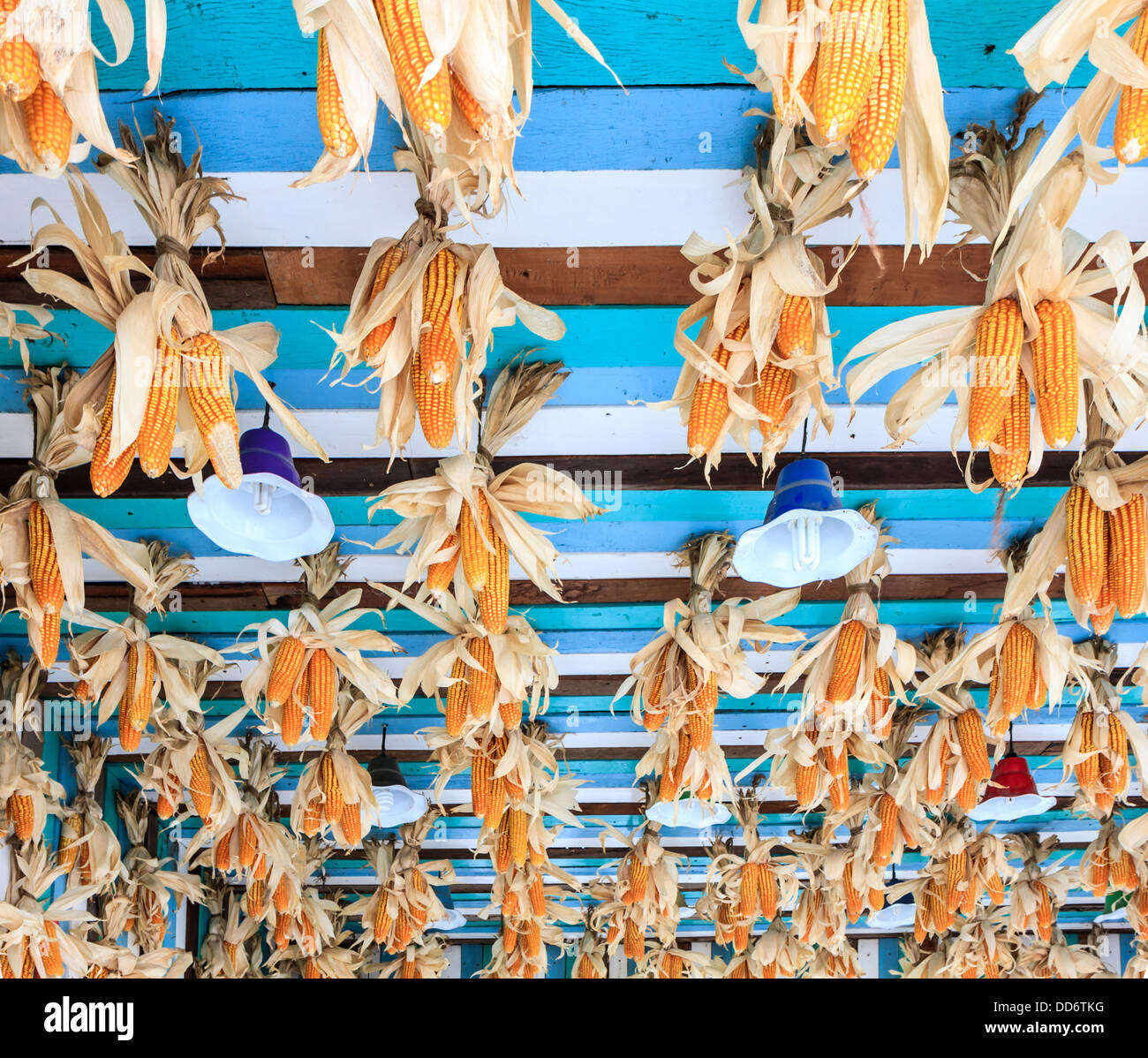 Many Corn with wooden background Stock Photo - Alamy