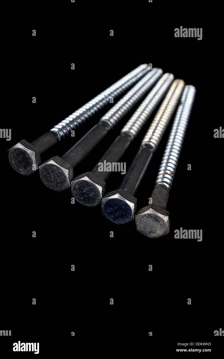 Screws on Black background Stock Photo - Alamy
