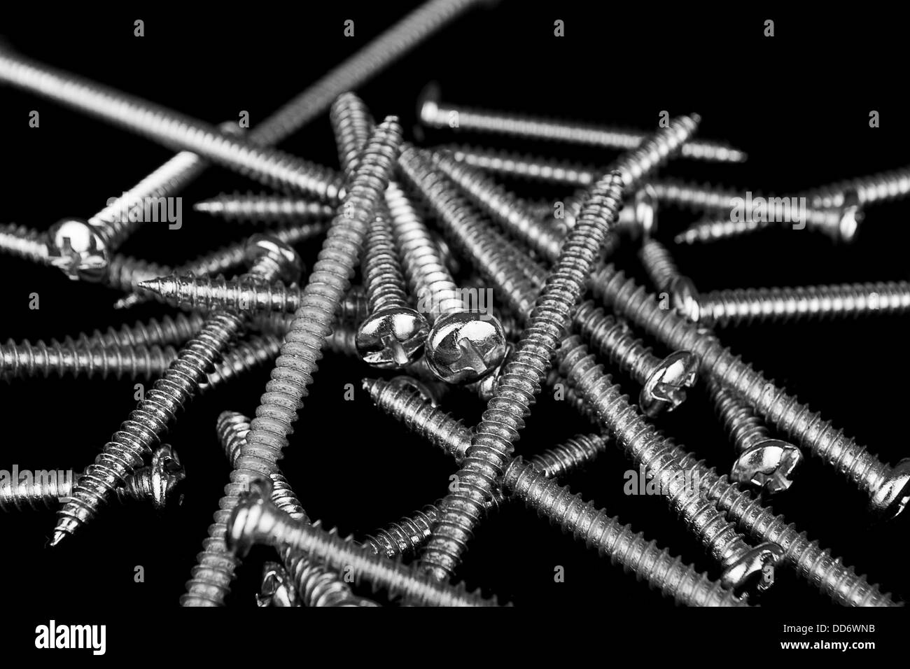 Screws on Black background Stock Photo - Alamy