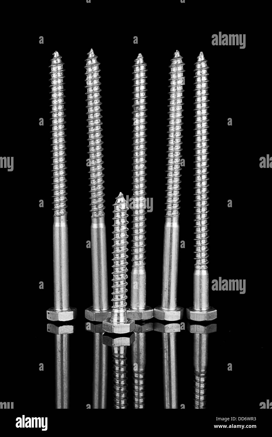 Screws on Black background Stock Photo - Alamy
