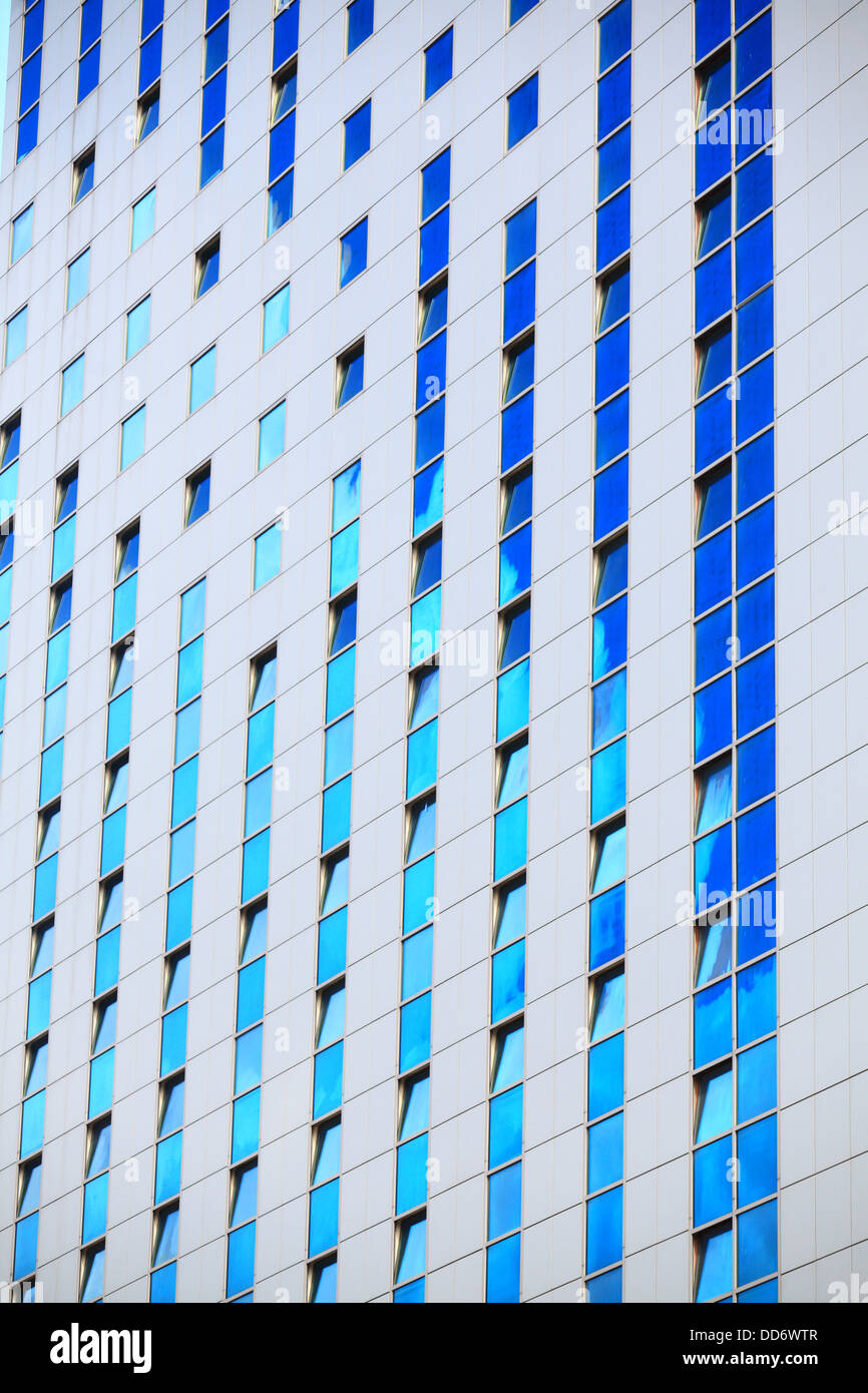 Blue and white modern business building. City life Stock Photo - Alamy