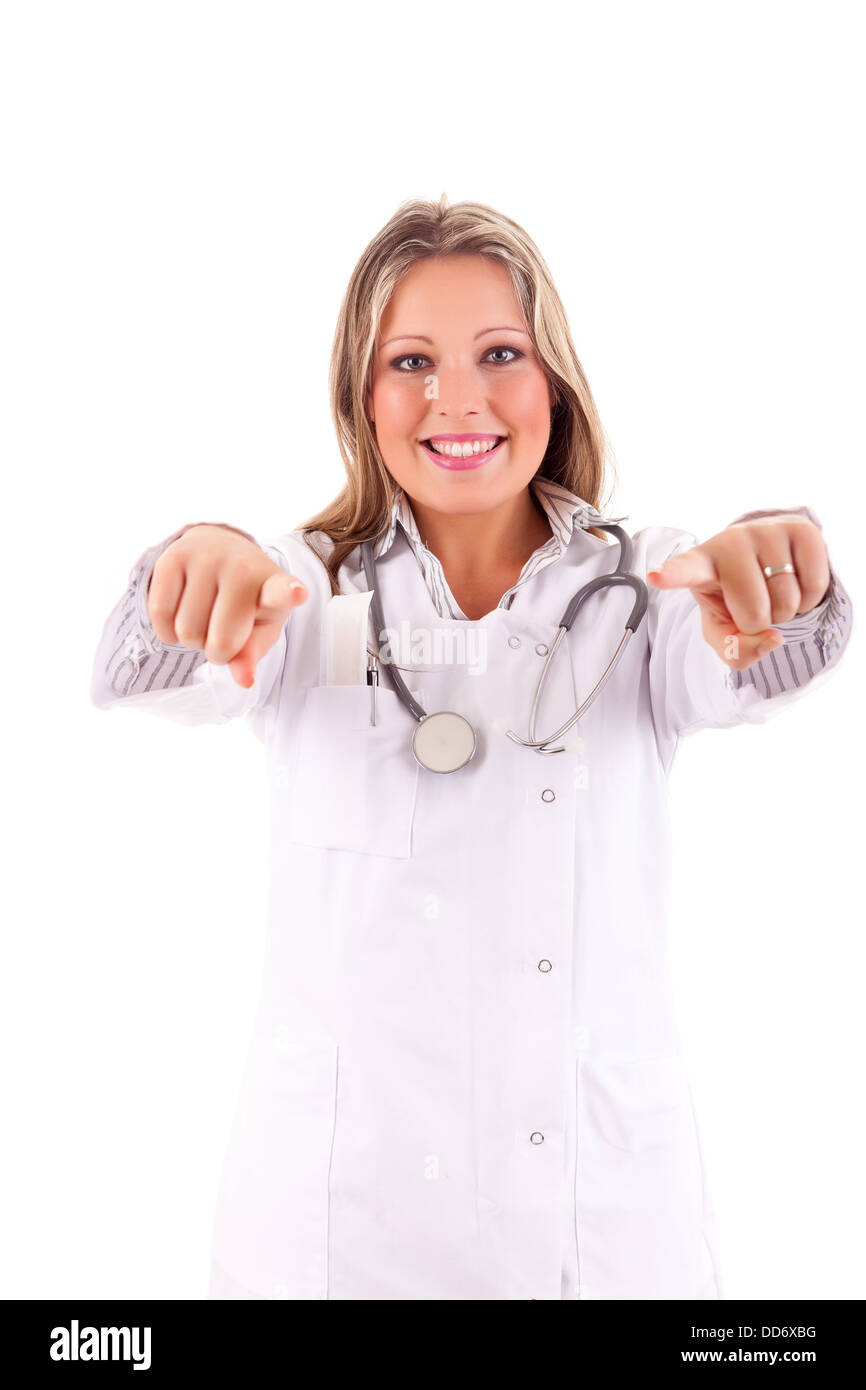 Young doctor pointing forward - isolated over white Stock Photo - Alamy