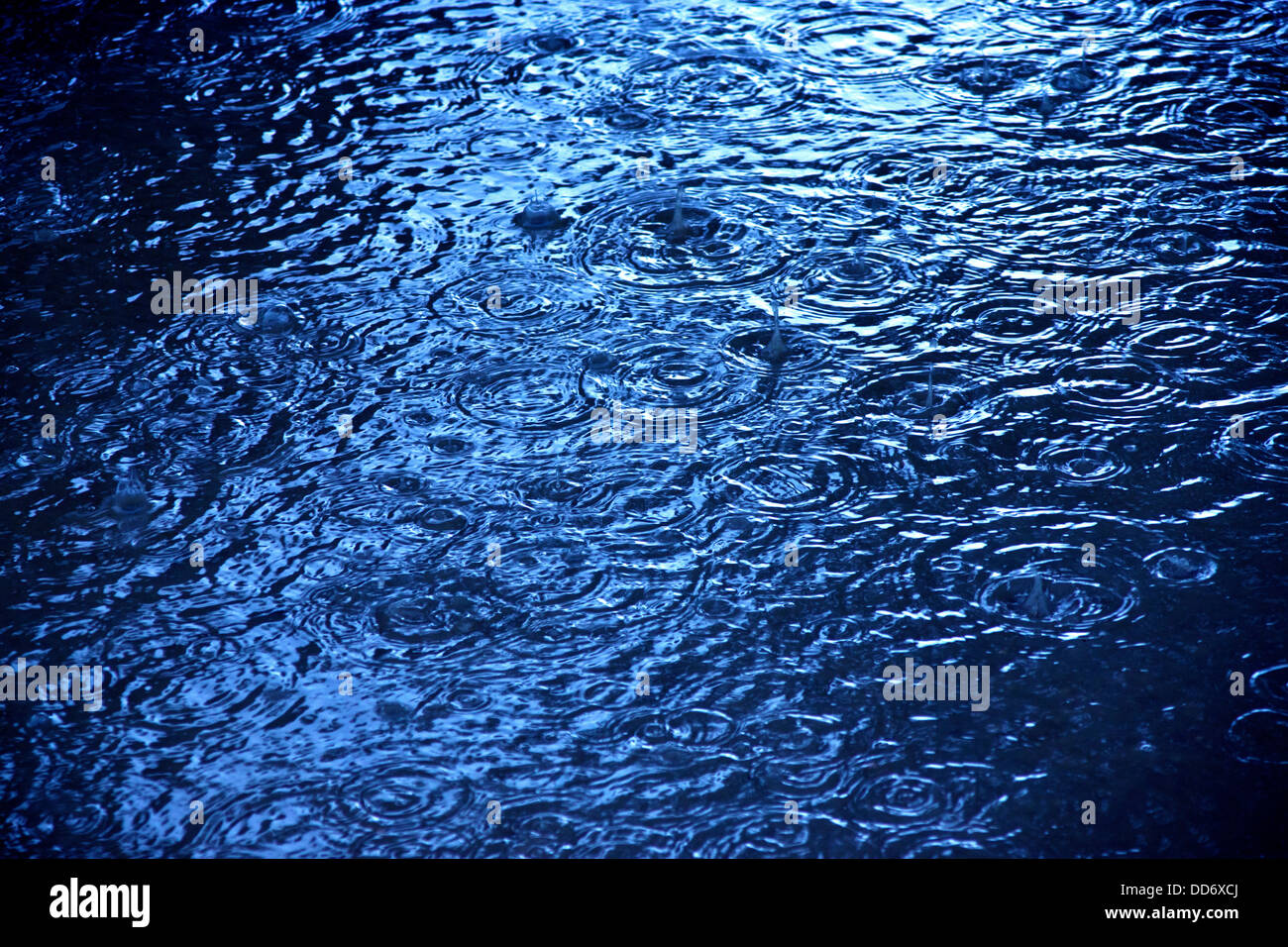 Rain on sea surface Stock Photo - Alamy