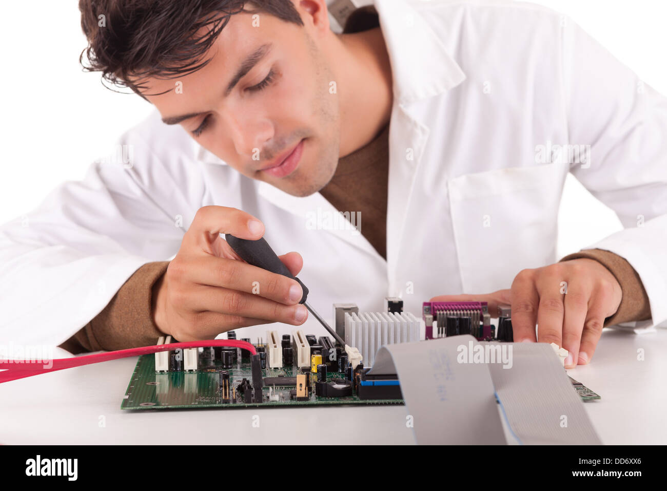 Happy and successful young computer engineer Stock Photo - Alamy