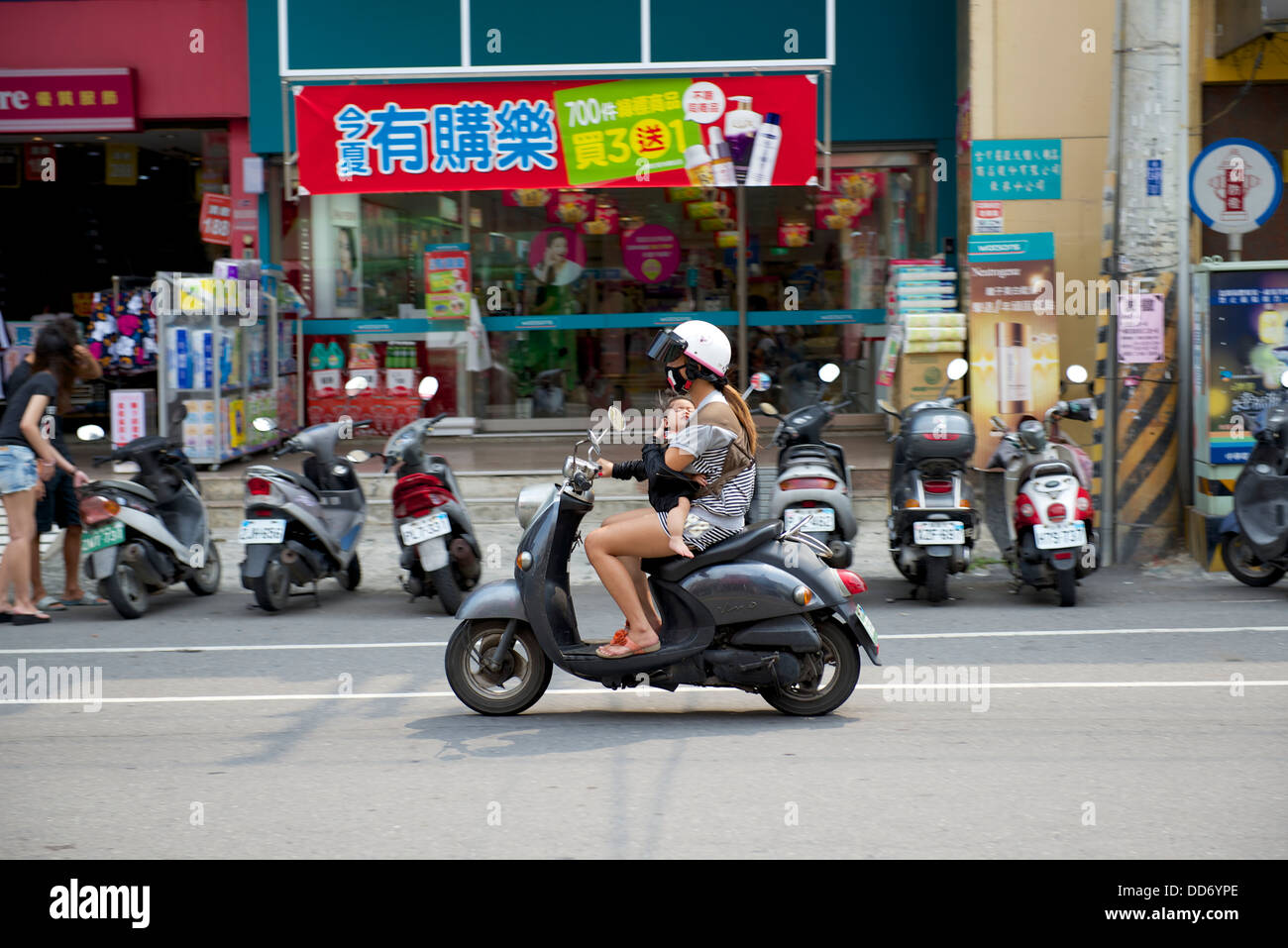 Moped and bicycles are a popular mode of transport in Taiwan Stock ...
