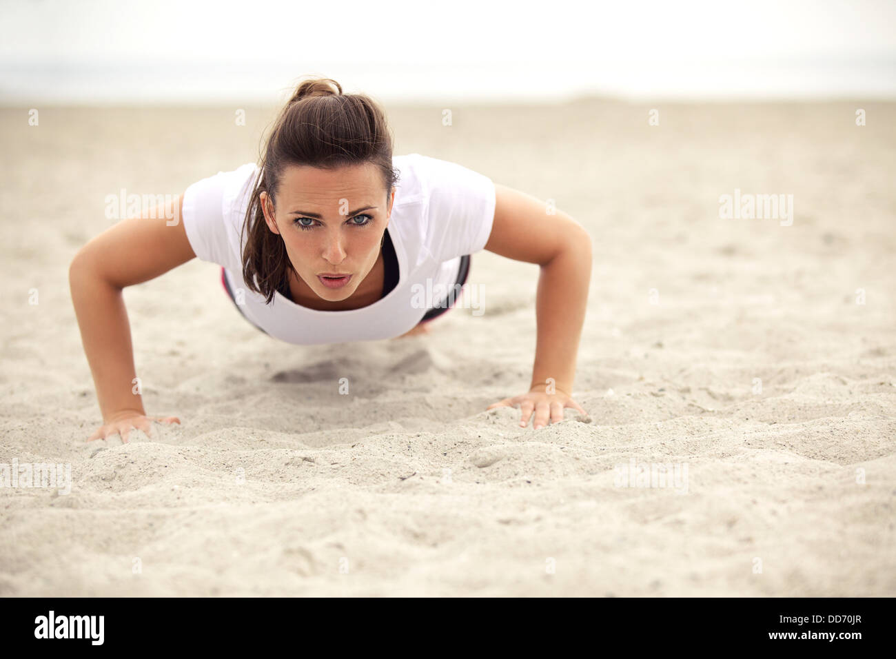Strong woman beach hi-res stock photography and images - Alamy