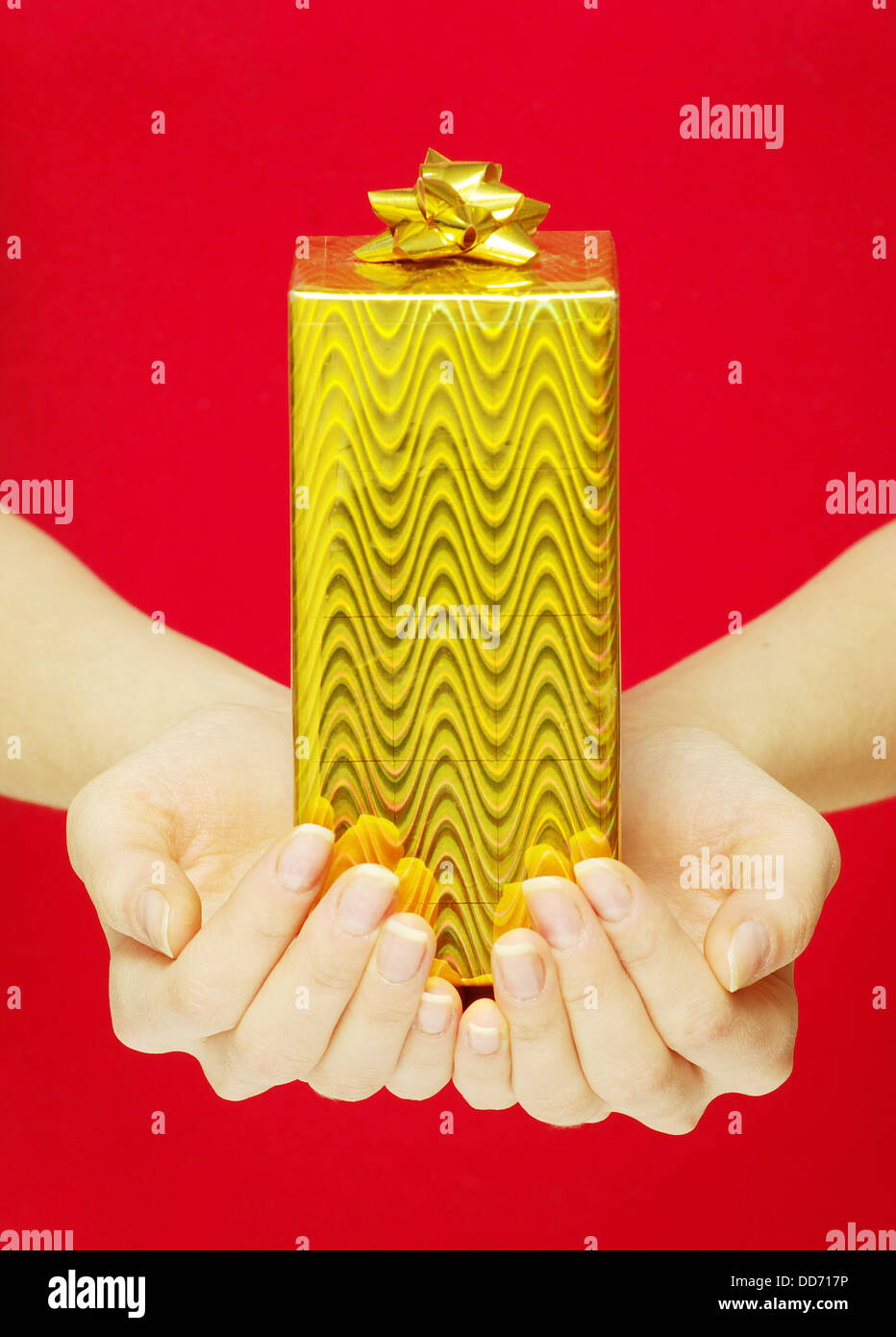 gift in hands Stock Photo - Alamy