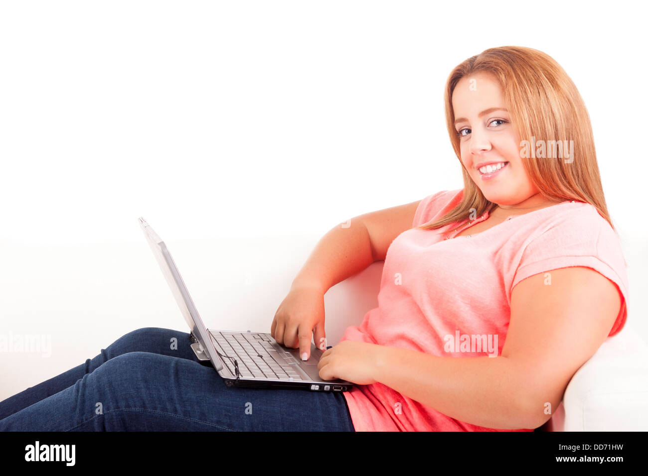 Young overweighted woman relaxing at home Stock Photo - Alamy
