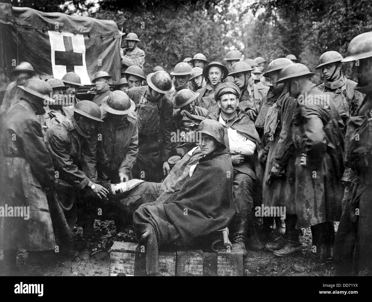 Wounded German prisoners receiving medical attention at first-aid ...