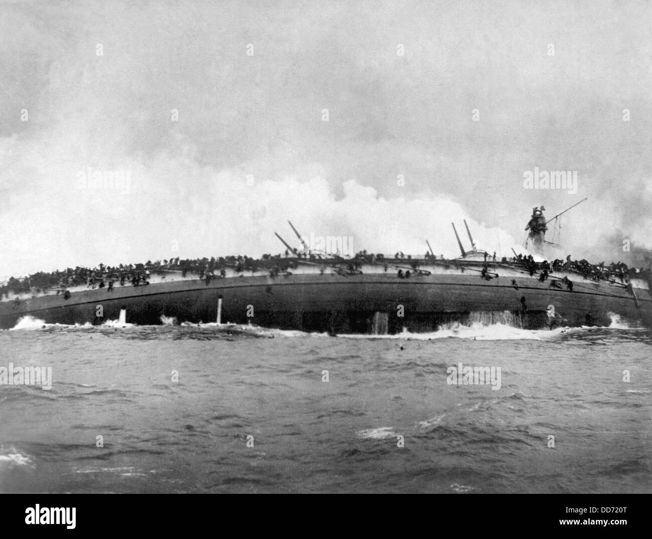 German sailors cling to the capsized and sinking of the Cruiser ...
