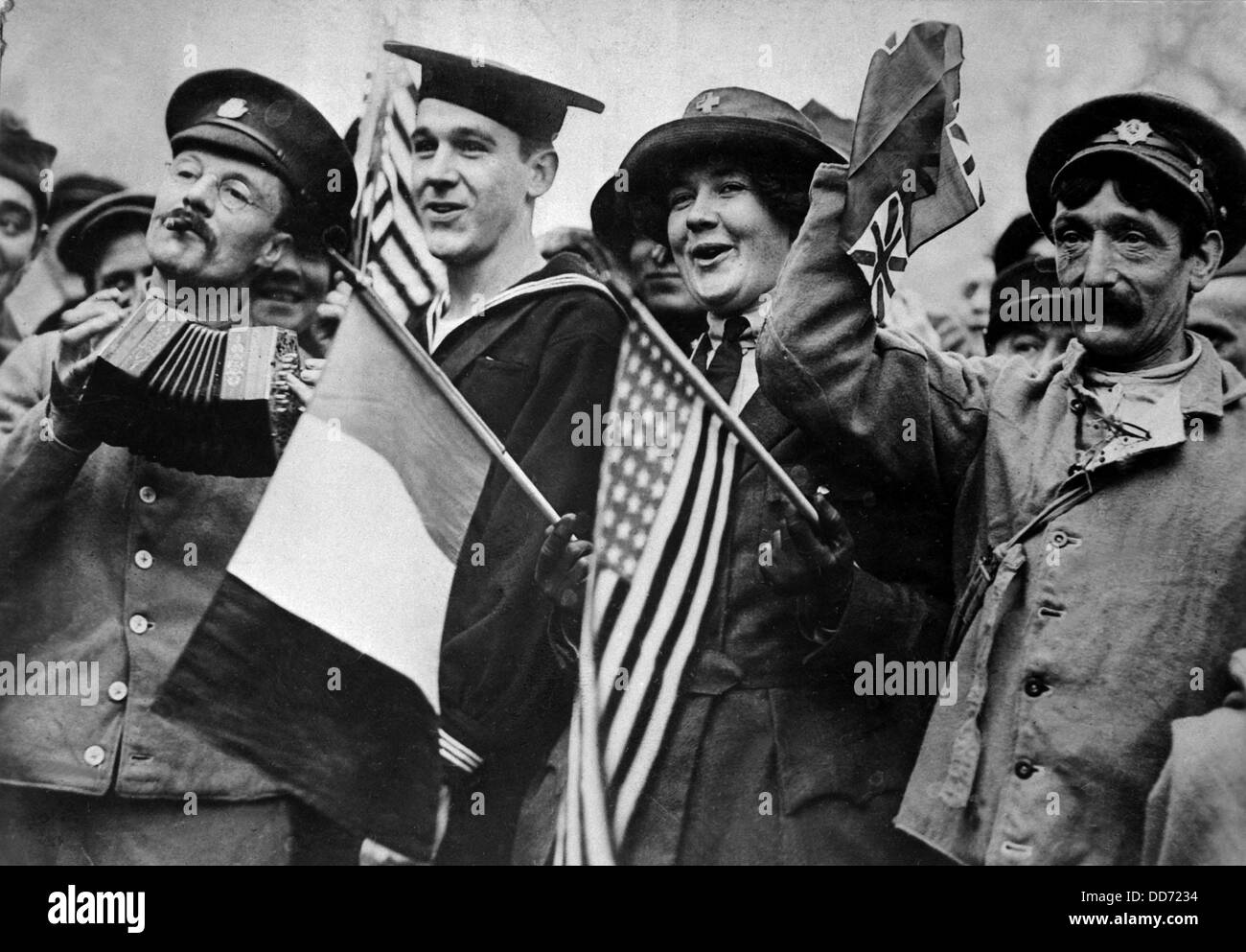 Yanks and Tommies (British soldiers) celebrate the armistice ending ...