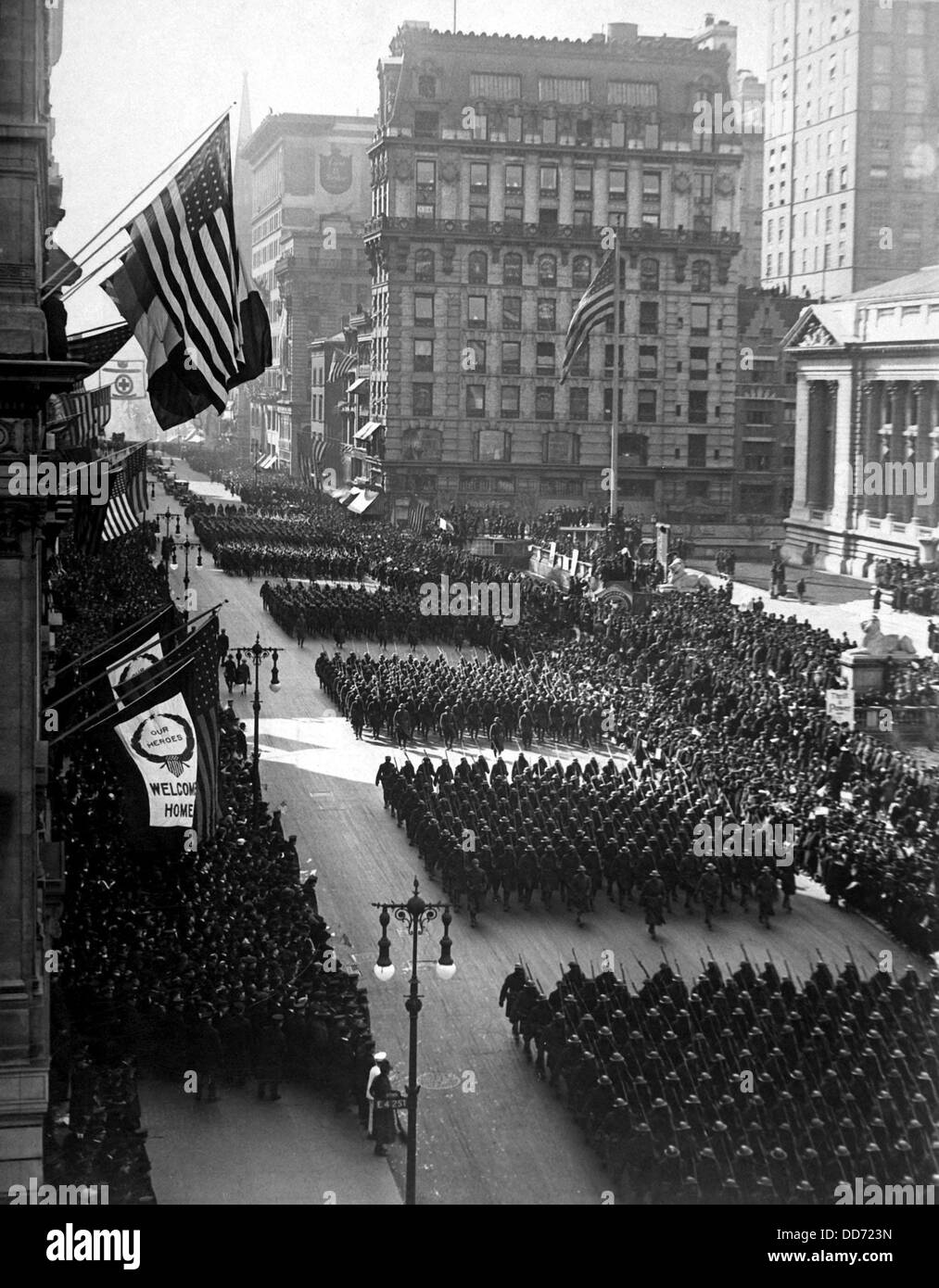 Victory Parade in honor of returned fighters passing the Public Library ...