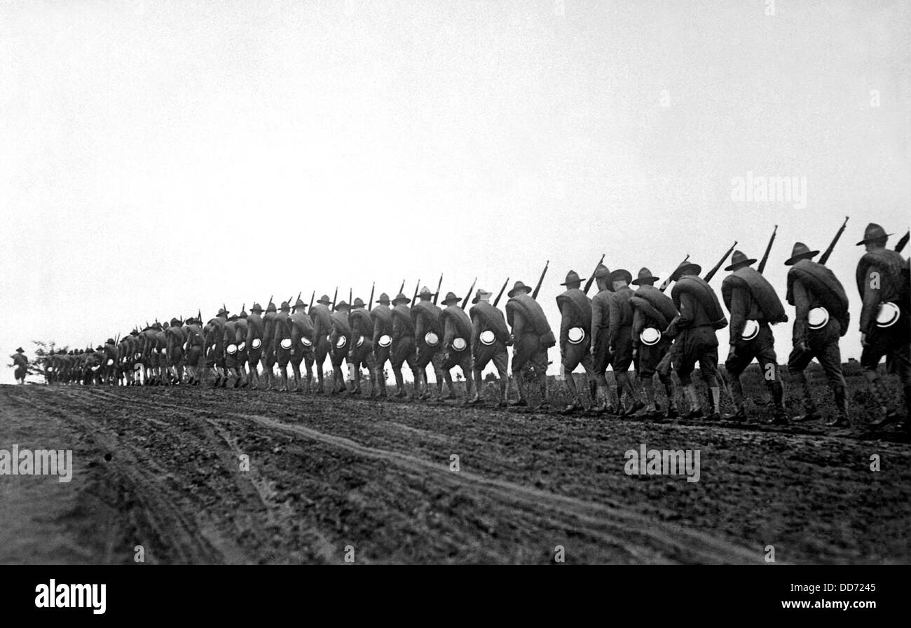 New York National Guard, silhouetted against the sky as they march to ...