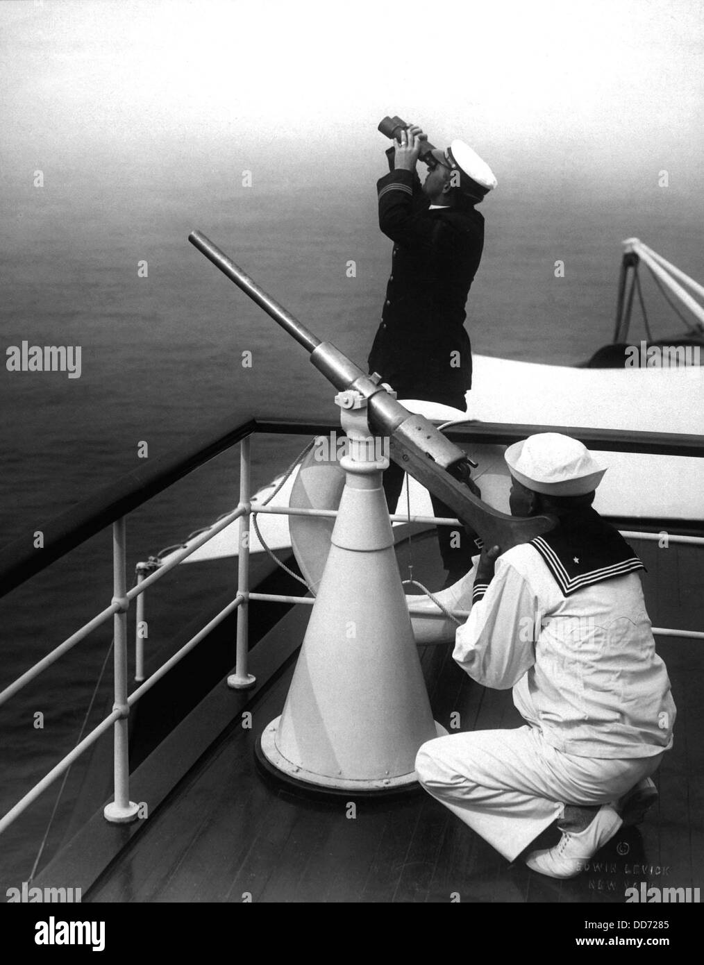 Anti-aircraft gun practice on a converted yacht requisitioned for use ...