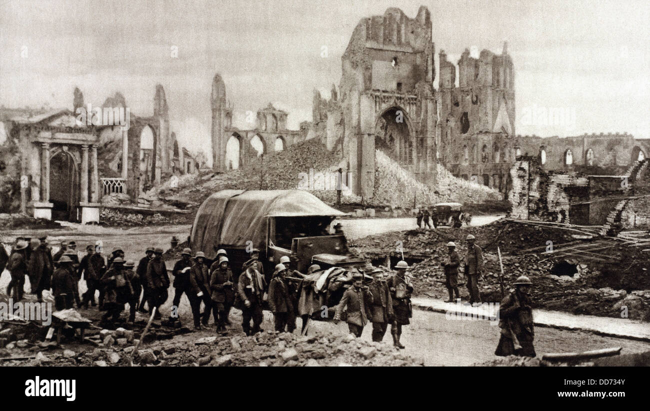World War 1. German prisoners being marched through the ruins of city ...