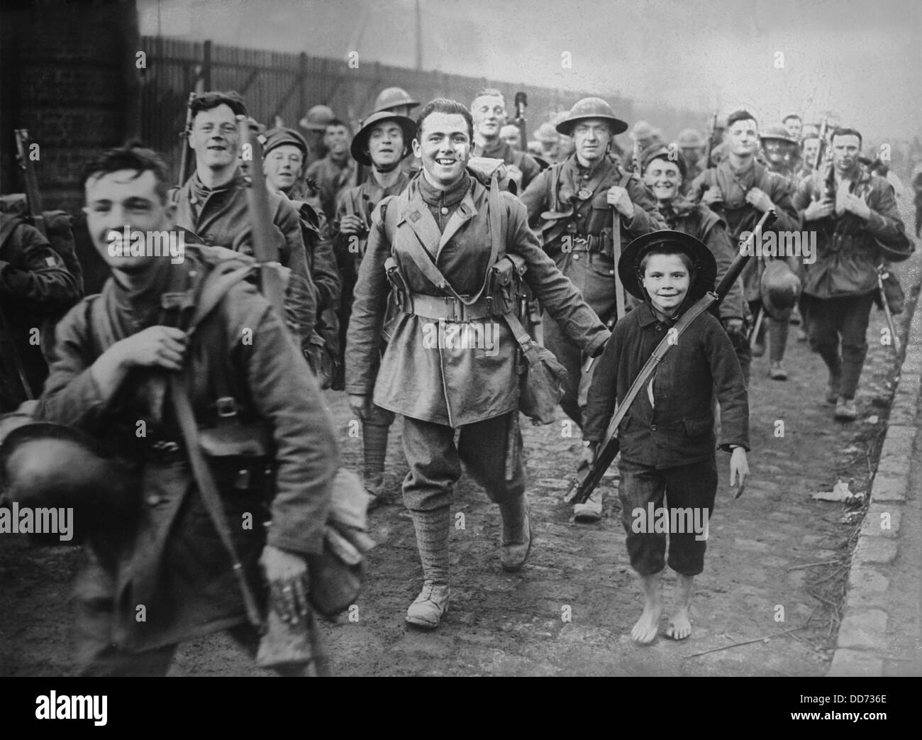 World War 1. Smiling British soldiers enter Lille, France. Photo was ...