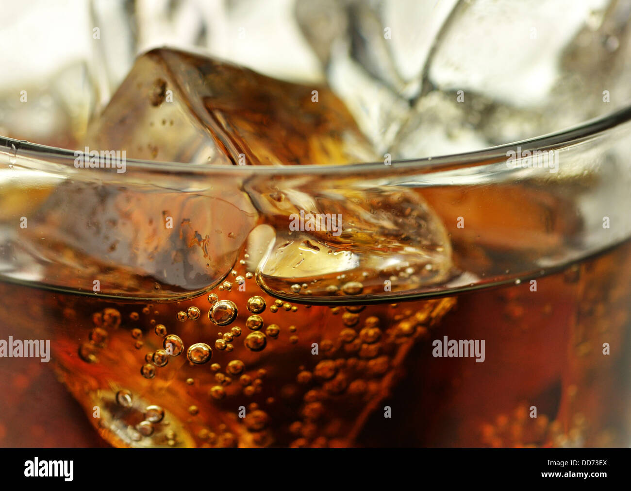 cola with ice cubes close up Stock Photo - Alamy