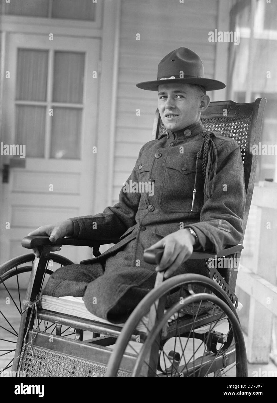 WW1 era uniformed U.S. soldier with both of his legs amputated. Ca ...