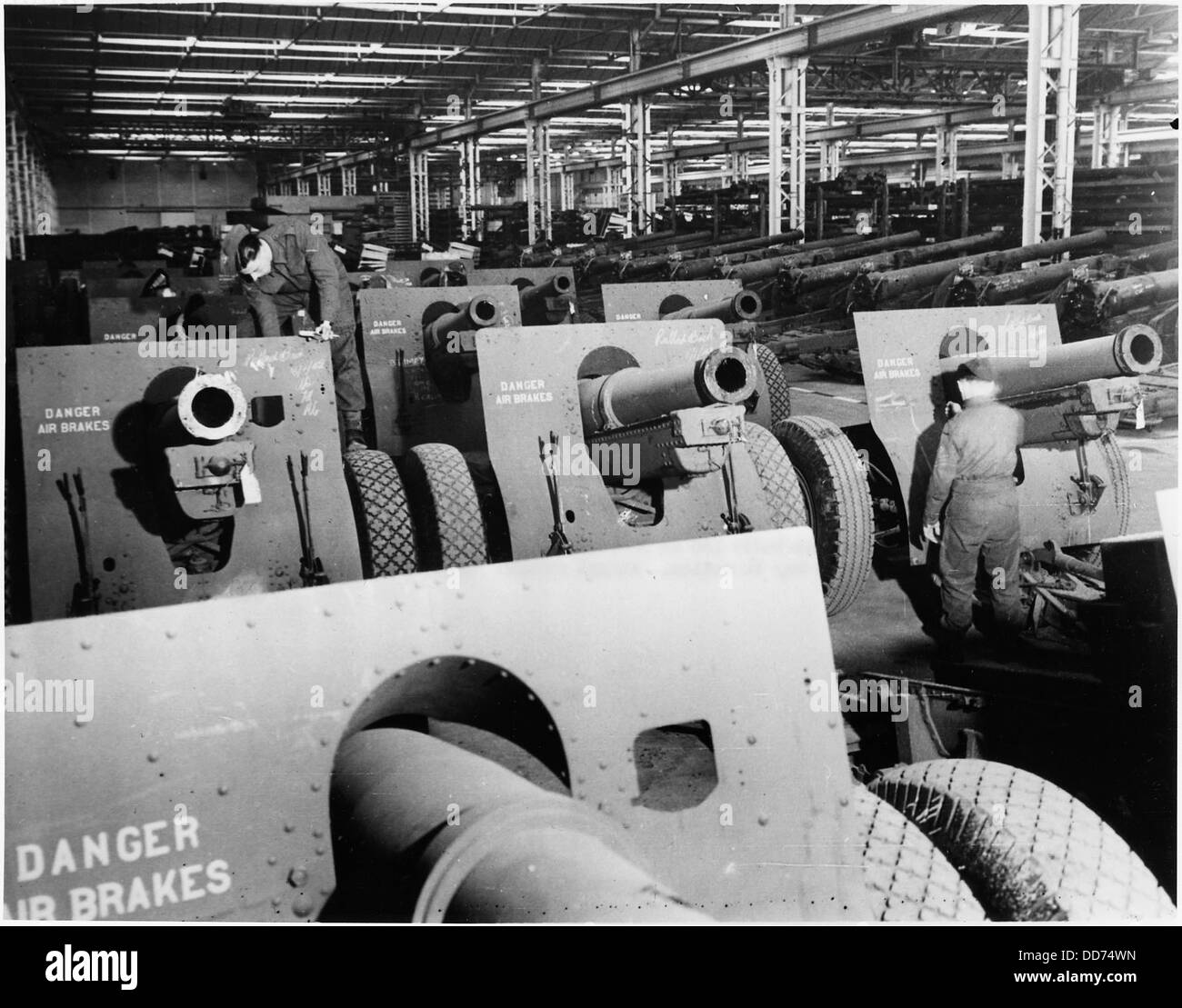 American-built 155 mm howitzers, part of the Lend-Lease program during ...