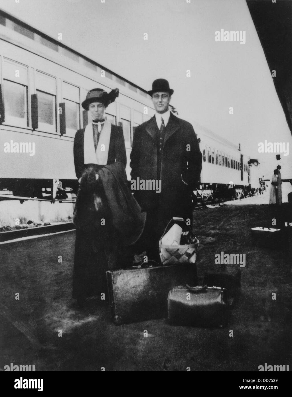 Franklin and Eleanor Roosevelt at a train station with luggage. 1910 ...