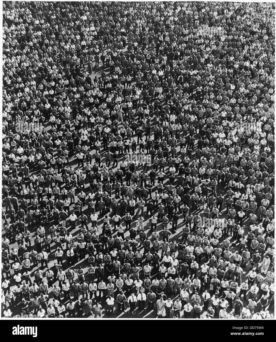 A crowd gathered at the Douglas Aircraft Plant, singing the Star ...