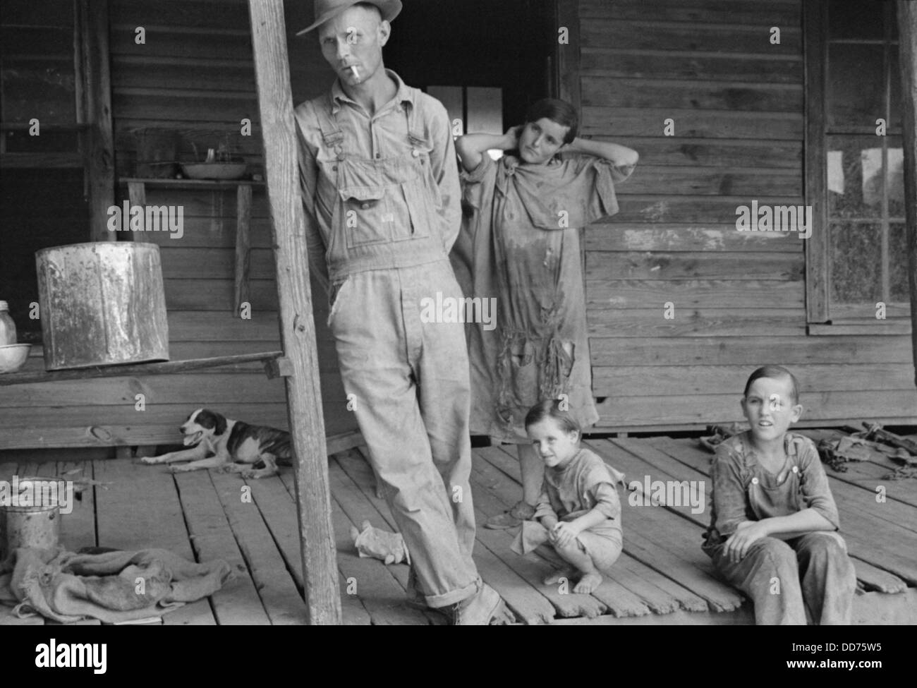 Floyd Burroughs, Alabama sharecropper, on his porch with neighbors ...