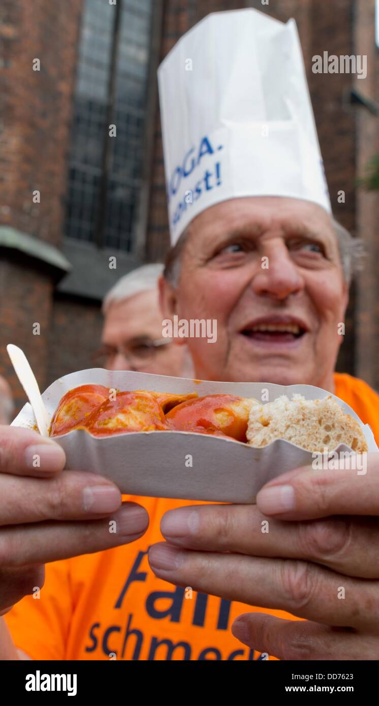 A man takes part in a Currywurst demonstration of Lower Saxon ...