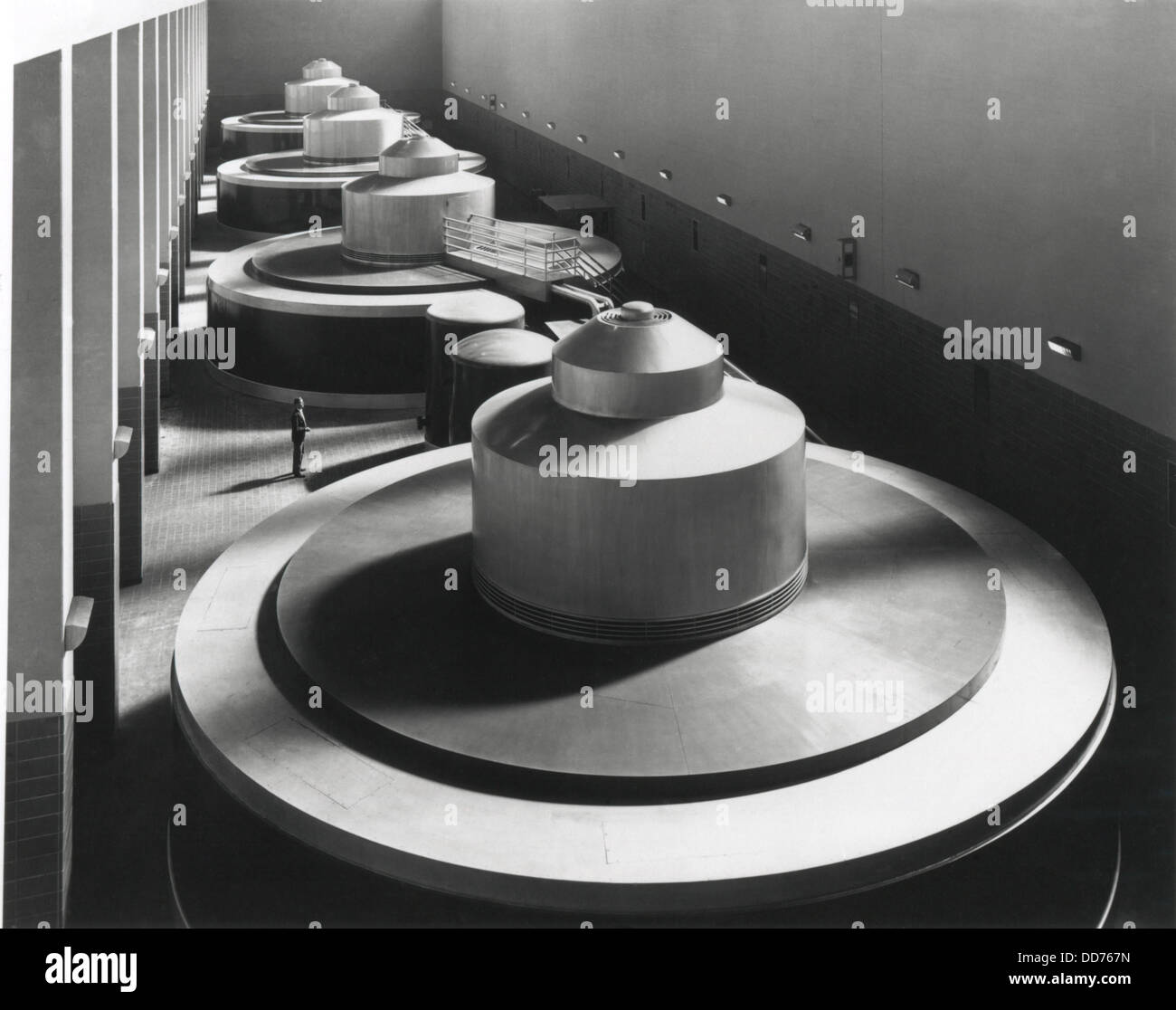 TVA's Pickwick Dam powerhouse, ca. 1938. View of four generators, by an ...
