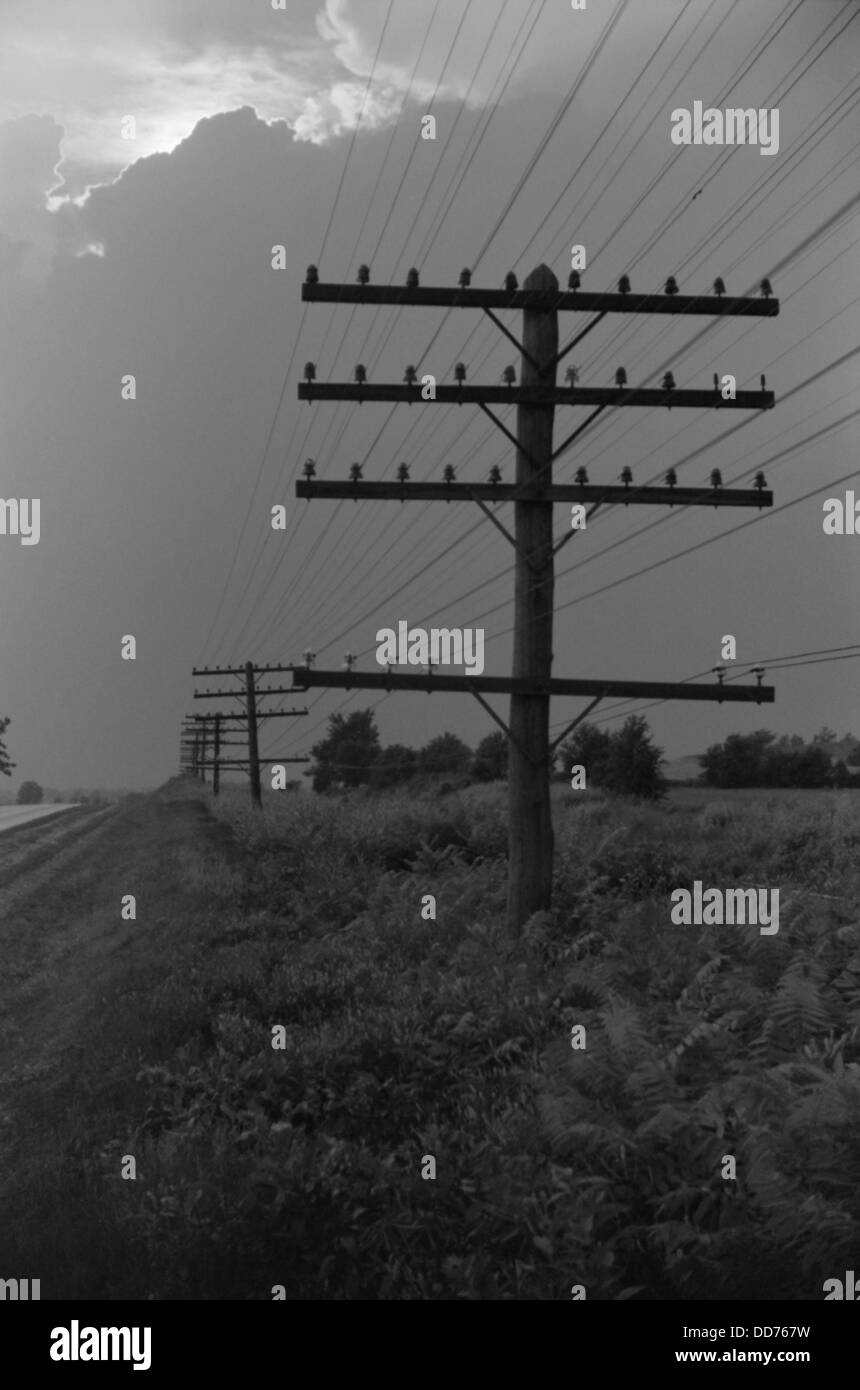 Electric lines taking power to rural Americans, ca. 1938. From 1935-39 ...