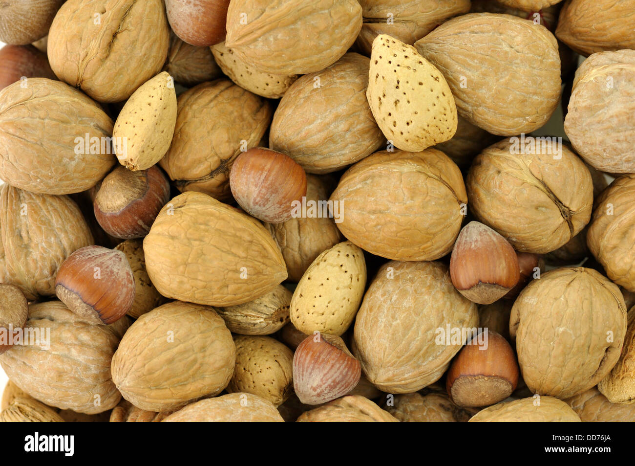 Mixed nuts background Stock Photo - Alamy