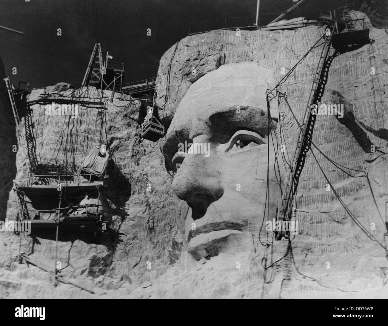 Face of Abraham Lincoln under construction on Mount Rushmore, South ...