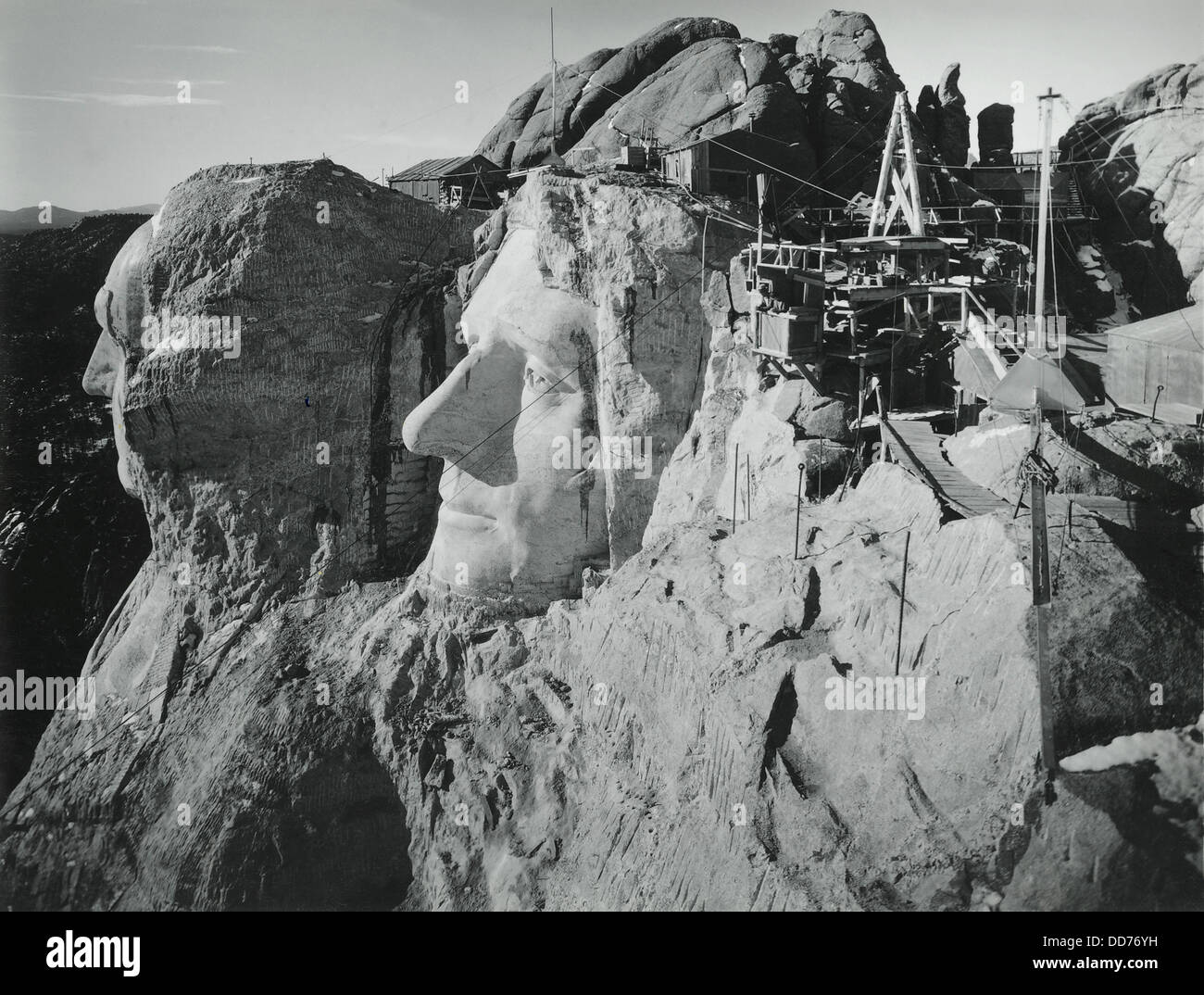 Work continues at Mt. Rushmore in winter, ca. 1935. Heads of Washington ...