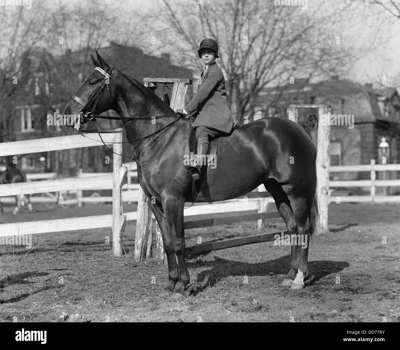 Daughter riding Black and White Stock Photos & Images - Alamy