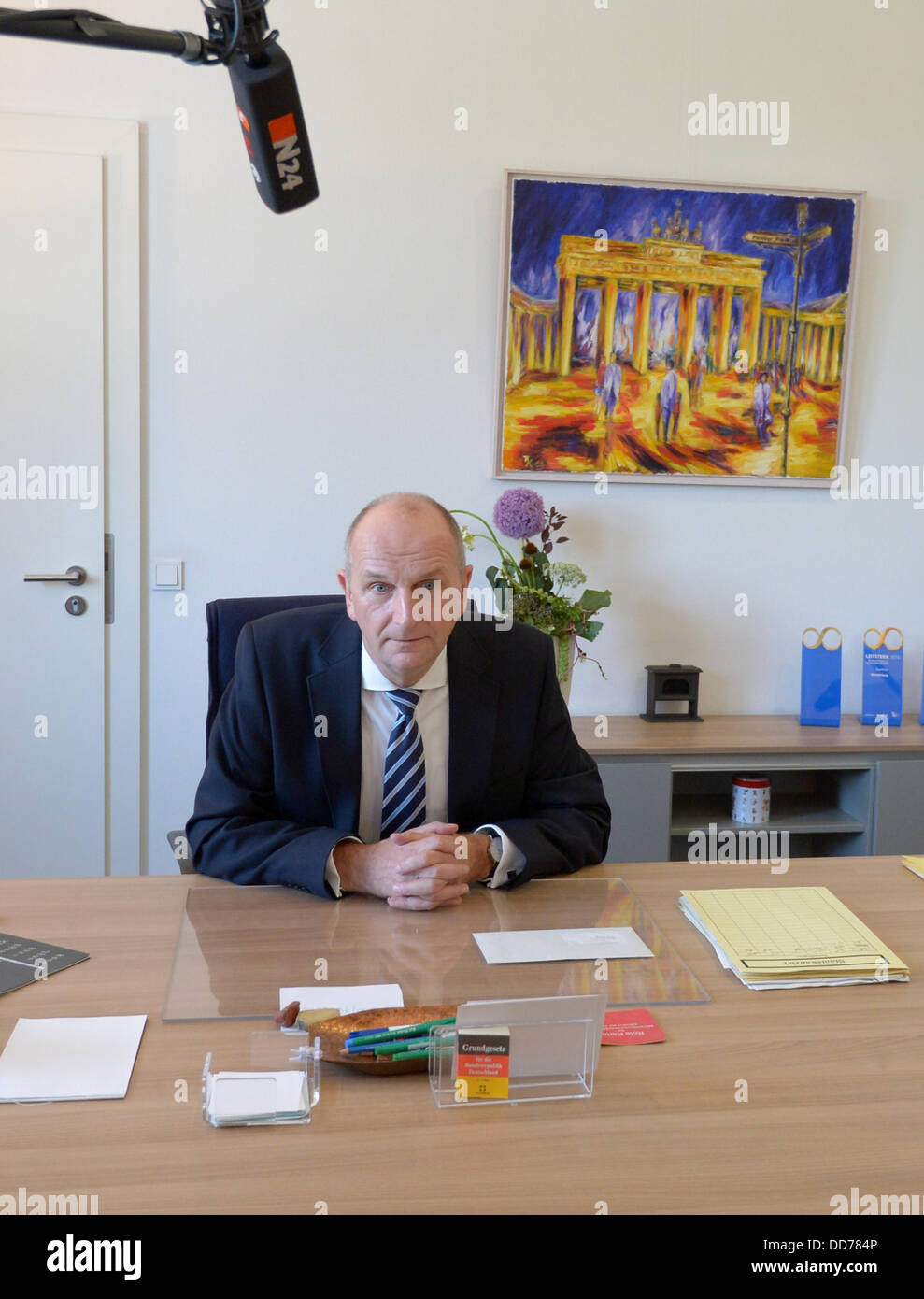 Brandenburg's newly elected premier Dietmar Woidke sits in his office ...