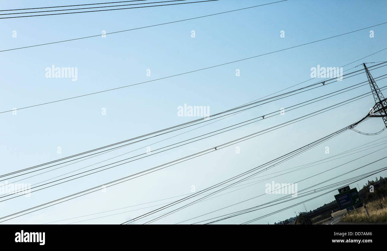 High Voltage pylons, electricity division, distribution Stock Photo - Alamy
