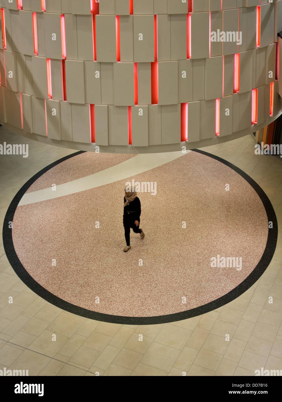 A woman walks through the hall of the new shopping mall Skyline Plaza ...