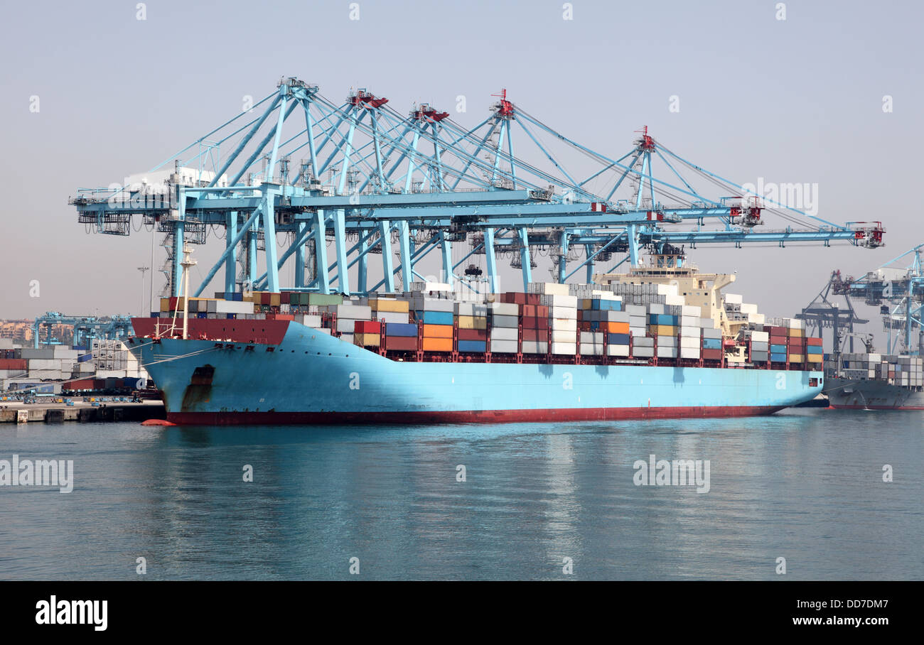 Big container ship in the industrial port Stock Photo - Alamy