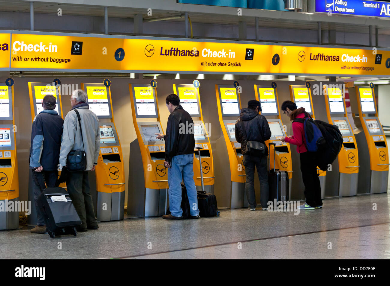 Germany, Hesse, People checking in at Lufthansa airport Stock Photo - Alamy