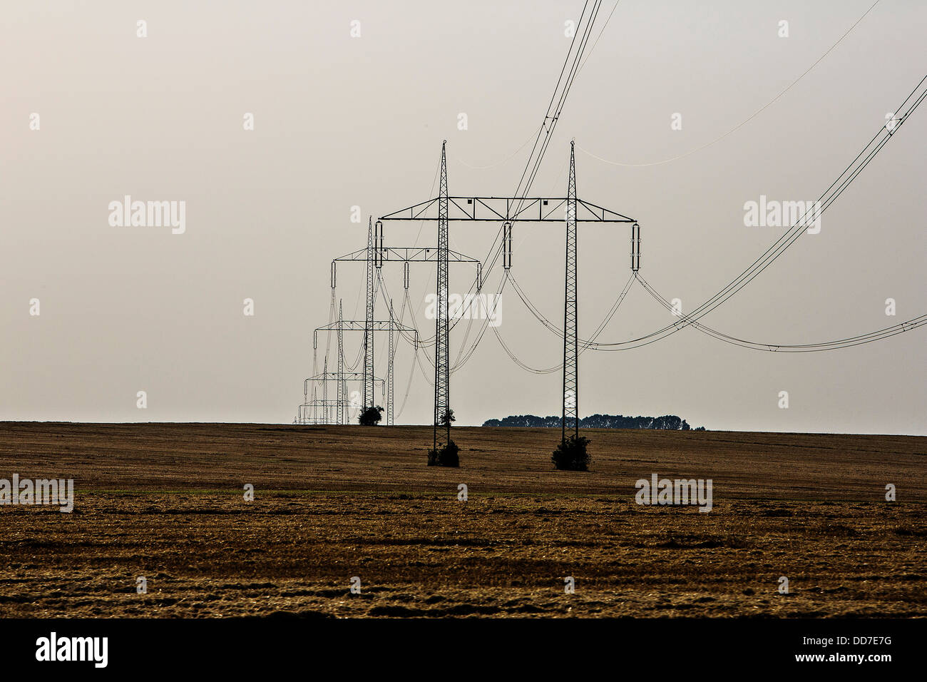 High Voltage pylons, electricity division, distribution Stock Photo - Alamy