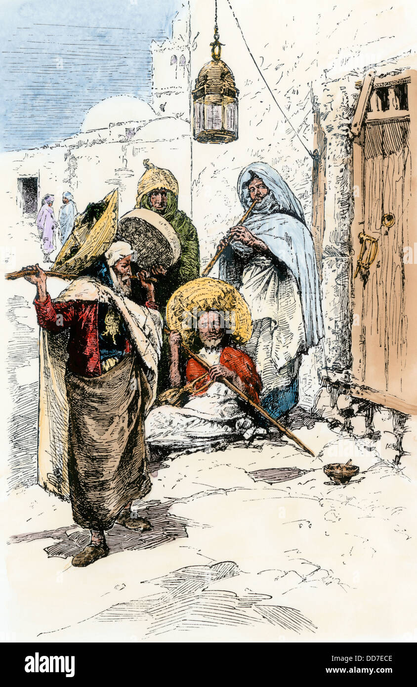 Wandering Muslim dervishes, North Africa, 1800s. Hand-colored woodcut ...