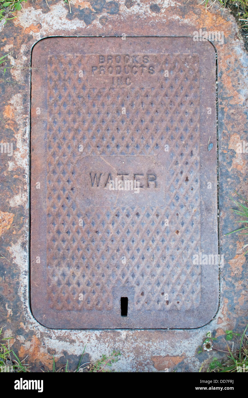 Old steel manhole cover plate over a water main valve in Spokane ...