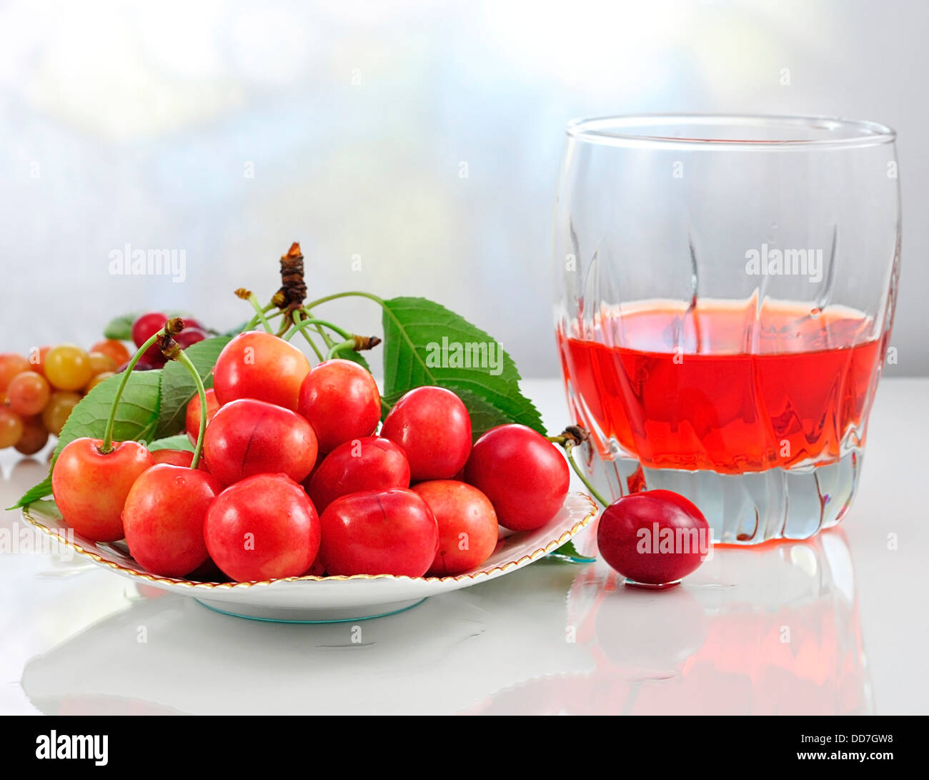 pink cherries and juice Stock Photo - Alamy