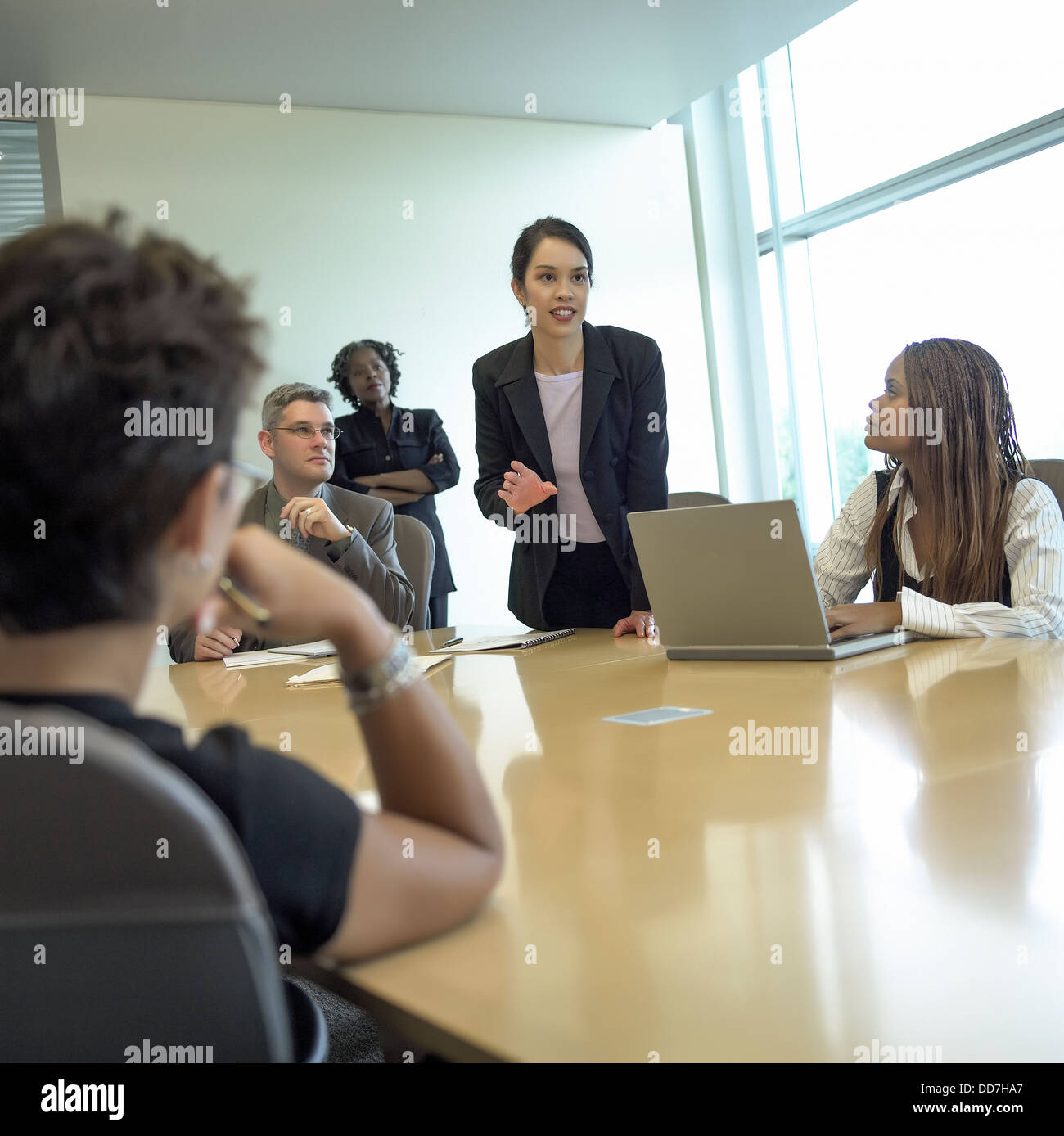 Sitting authority leadership communication meeting hi-res stock ...