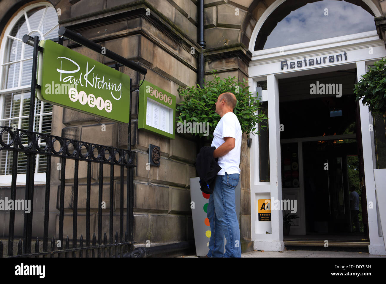 Man reading the menu outside the Edinburgh Paul Kitching restaurant ...