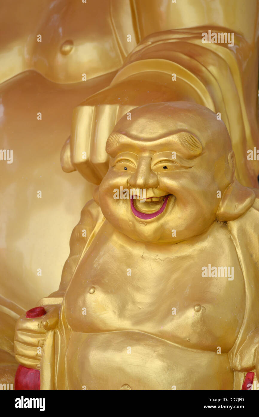 Fat gold buddha statue hi-res stock photography and images - Alamy
