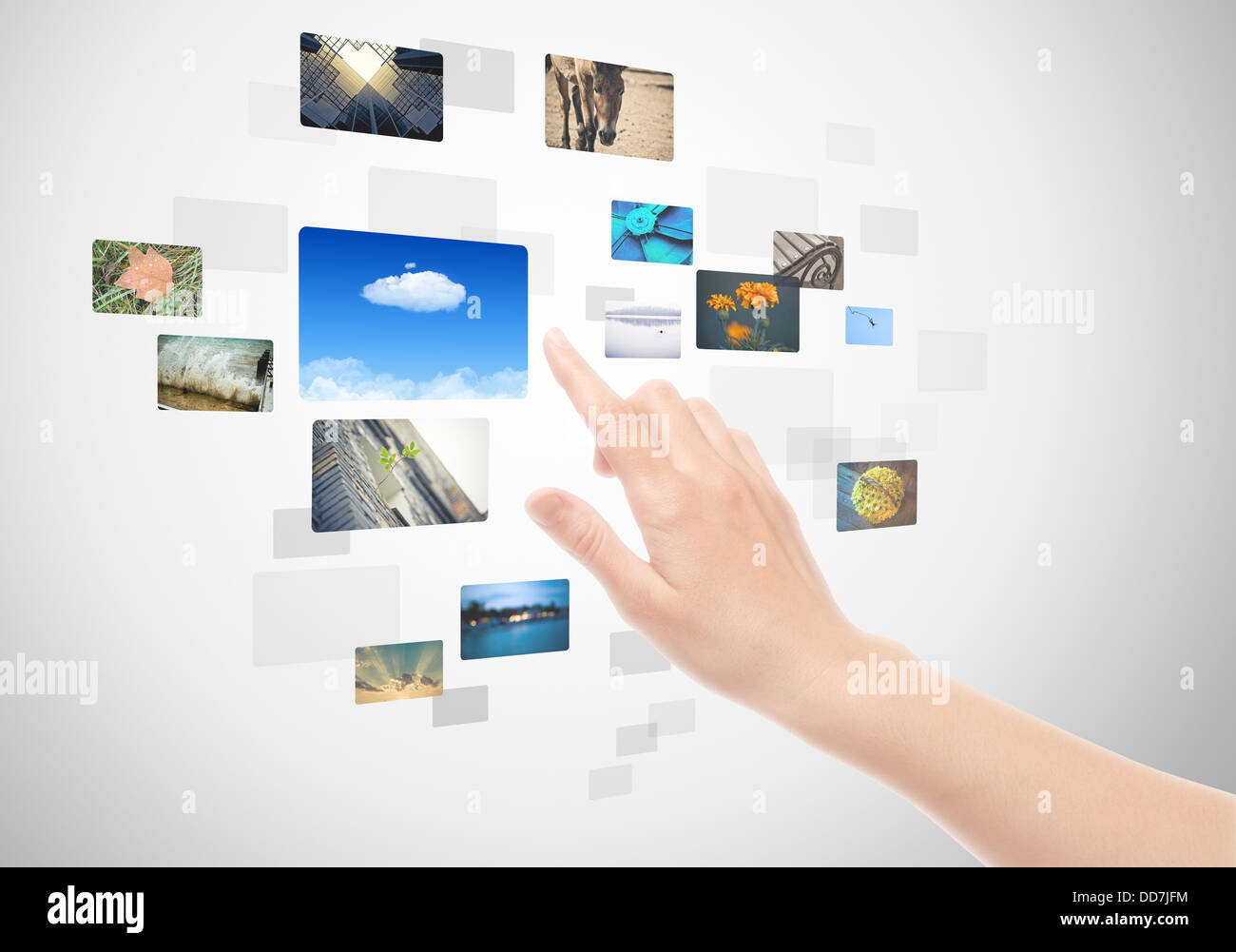 Hand Using Touch Screen Interface With Pictures Stock Photo - Alamy