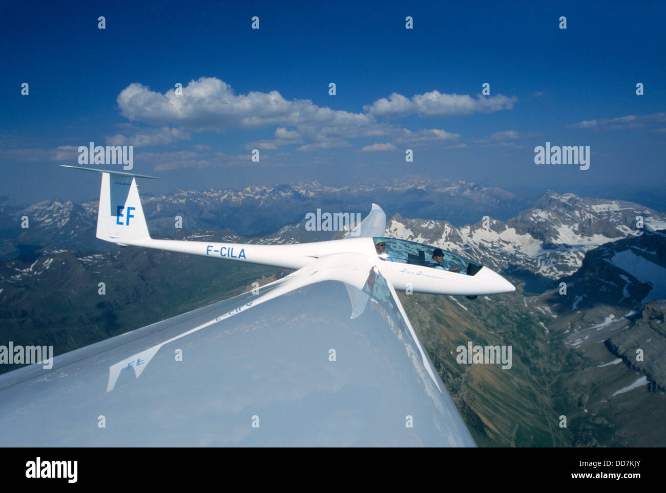 Glider plane Duo Discus flying over Pyrenees mountains, north of Jaca ...