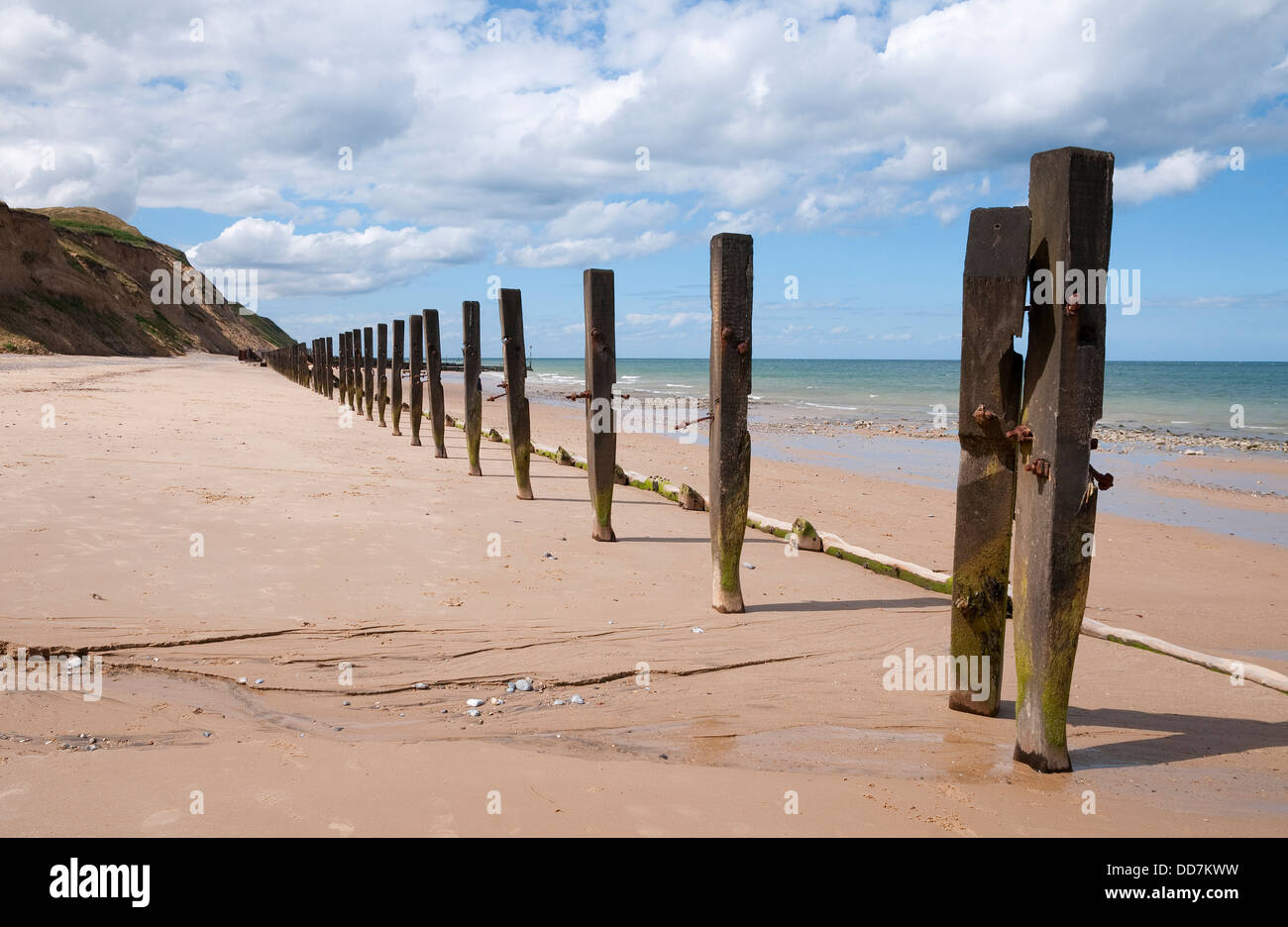 timber sea defences at west runton, north norfolk, england Stock Photo ...